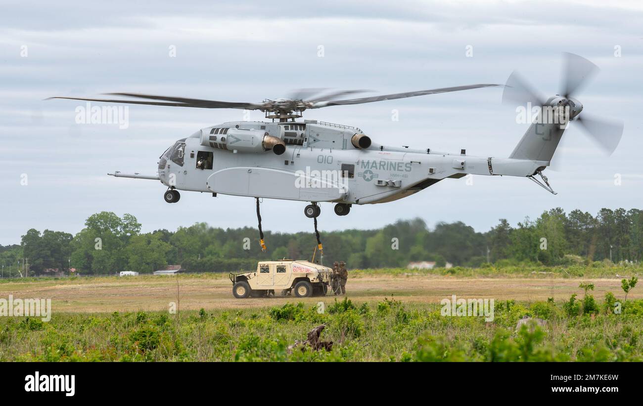 U.S. Marines put a static line on a humvee during Exercise Potomac ...