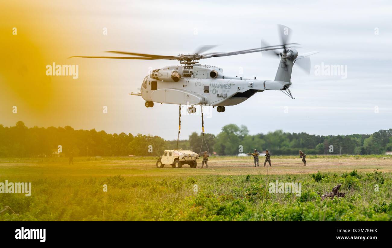 U.S. Marines put a static line on a humvee during Exercise Potomac ...