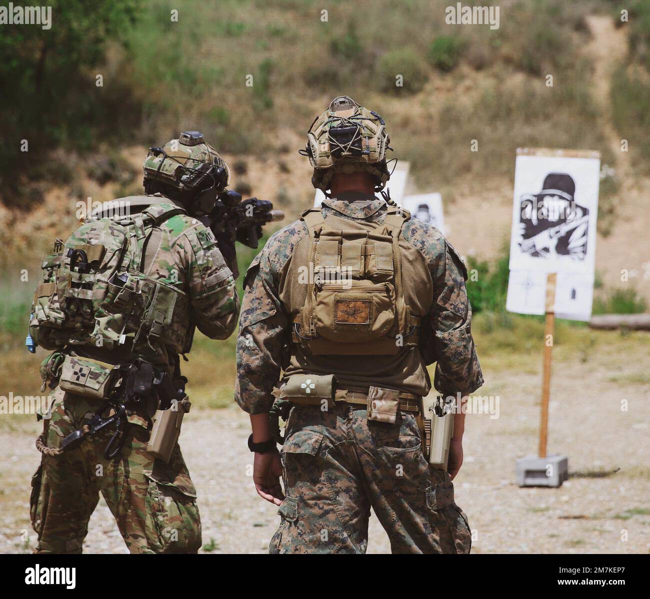 U.S. Marine Corps Sgt. Connor Barton, right, from Wagoner, Oklahoma ...