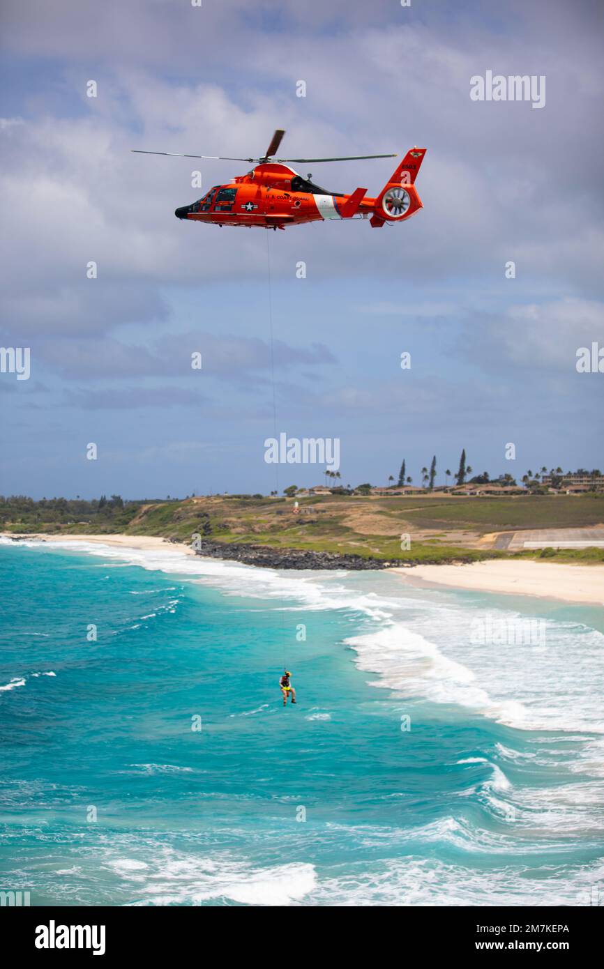 U.S. Coast Guardsmen from Coast Guard Air Station Barbers Point prepare ...