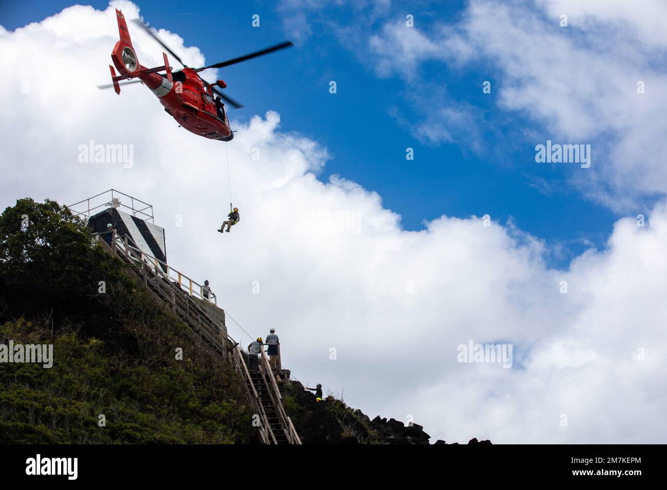 A U.S. Coast Guard flight mechanic with Coast Guard Air Station Barbers ...