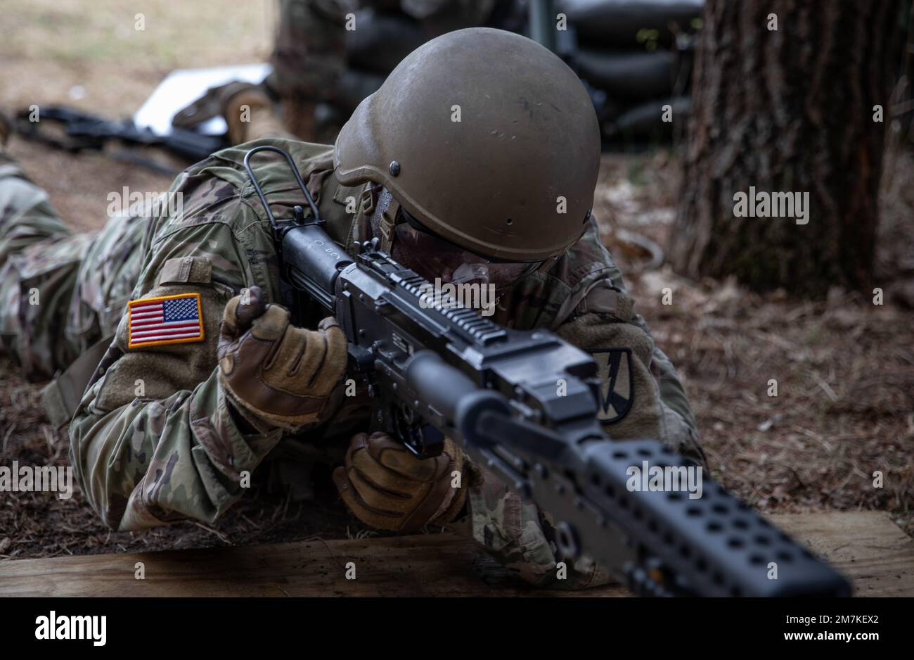 Staff Sgt. Valsin Anders performs a functions check on a M240B machine ...