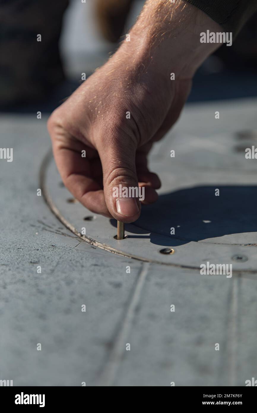 U.S. Marine Corps Cpl. Simon Church, a power line mechanic with Marine ...