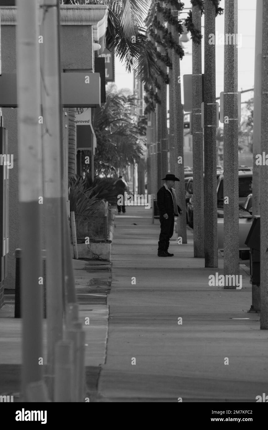 Cowboy on Atlantic ave with Christmas decorations in the city of bell ...
