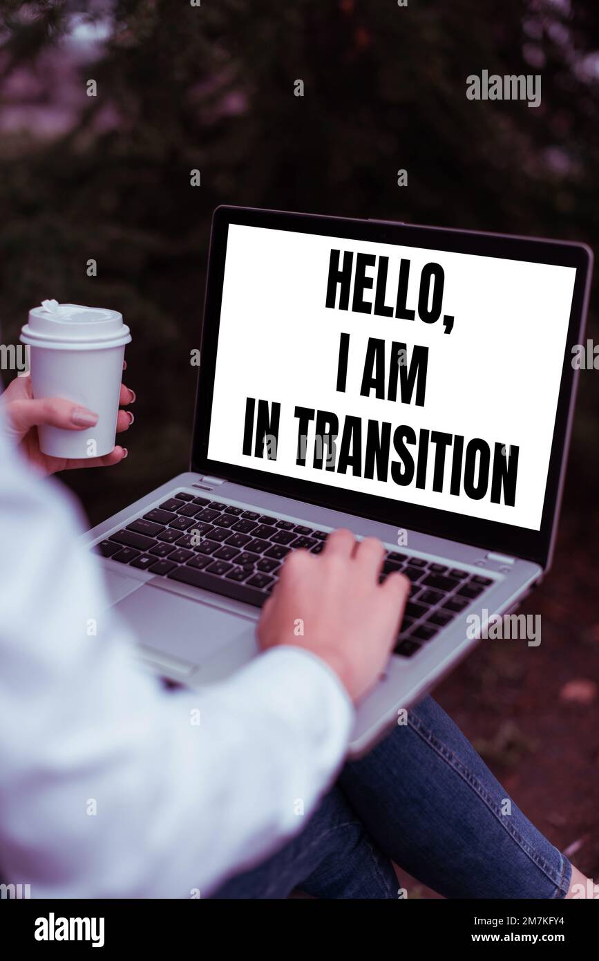 Hand writing sign Hello, I Am In Transition. Business idea a period or ...