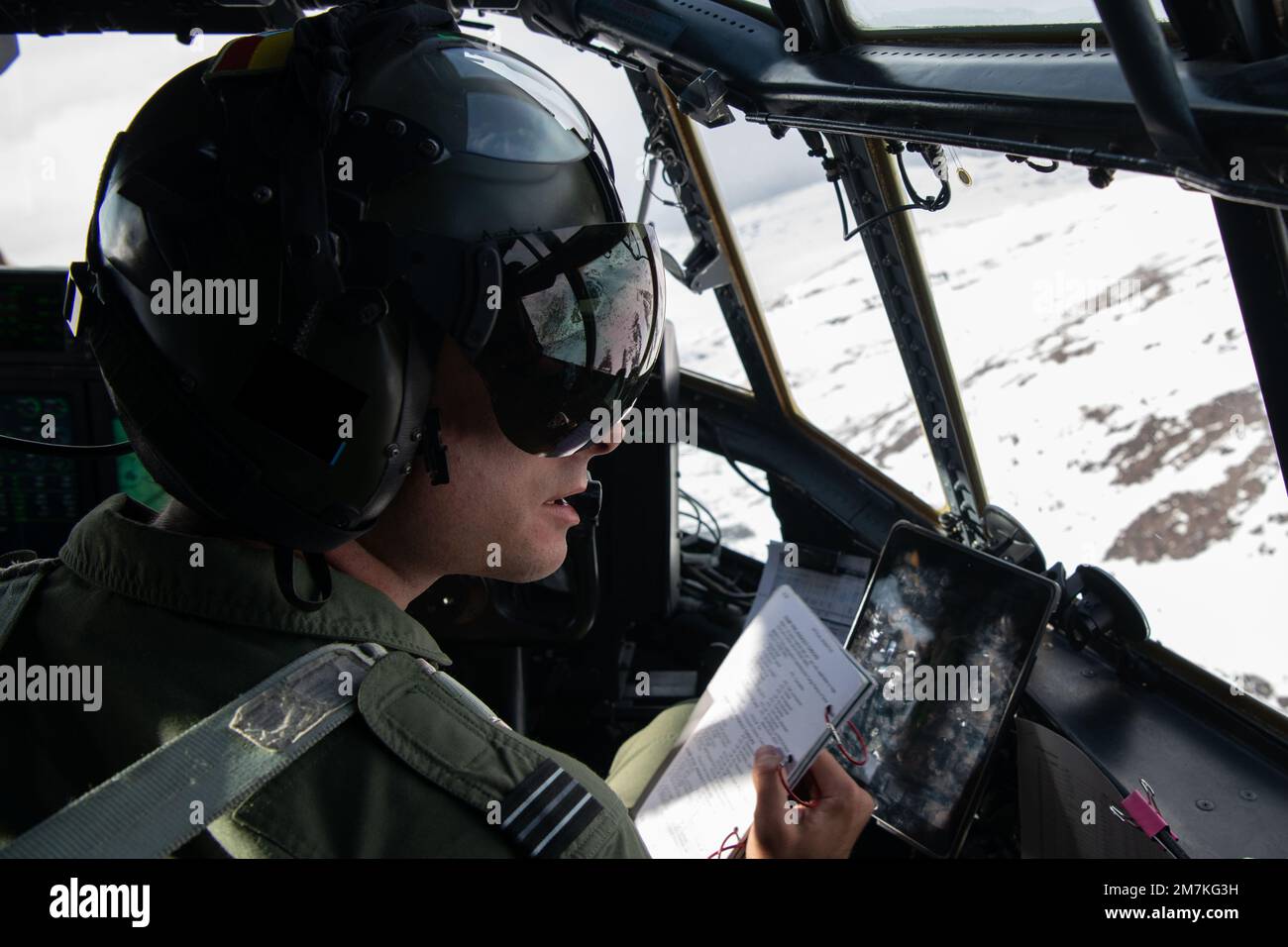 A Royal Air Force C-130J Hercules pilot, assigned to No. 47 Squadron ...