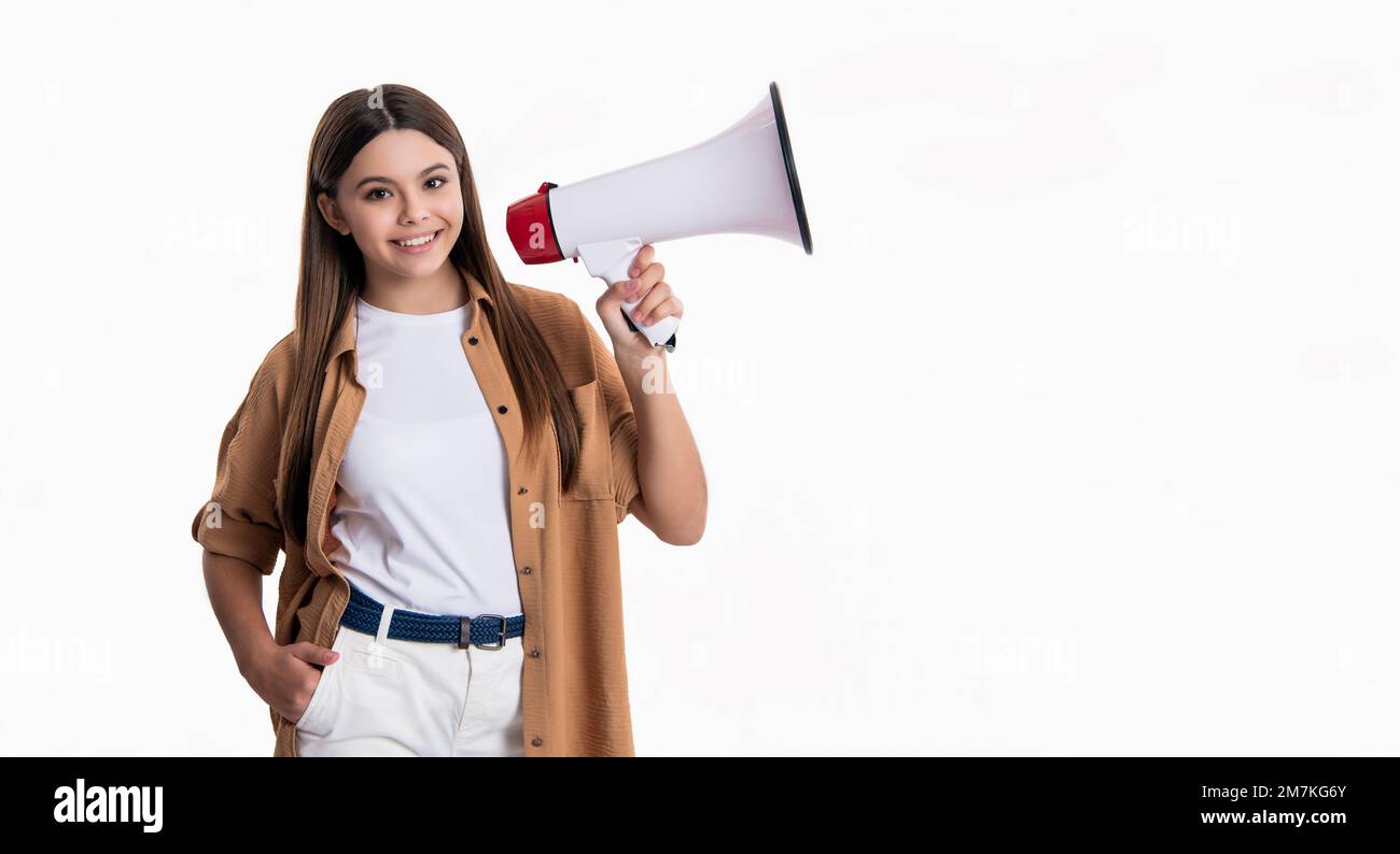 smiling teen girl announcer with loudspeaker isolated on white. teen ...