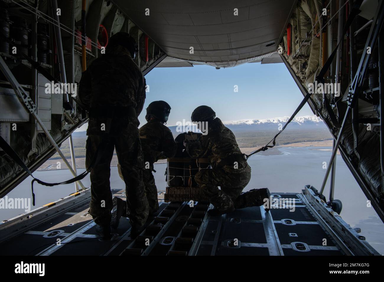 British Army soldiers conduct an air drop out of a Royal Air Force C ...