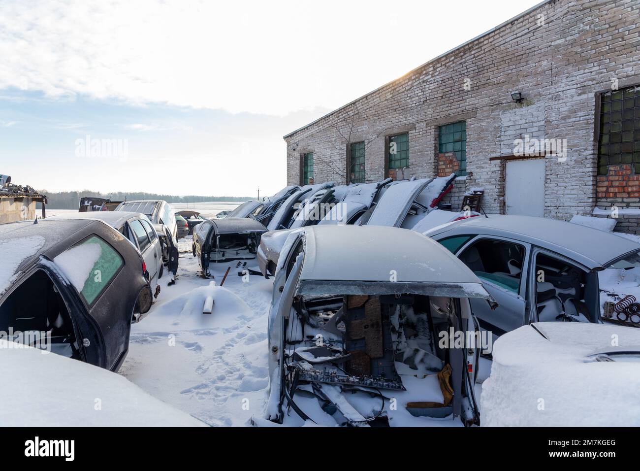 Disassembled cars on a car dump are on sale for spare parts. Trade in ...