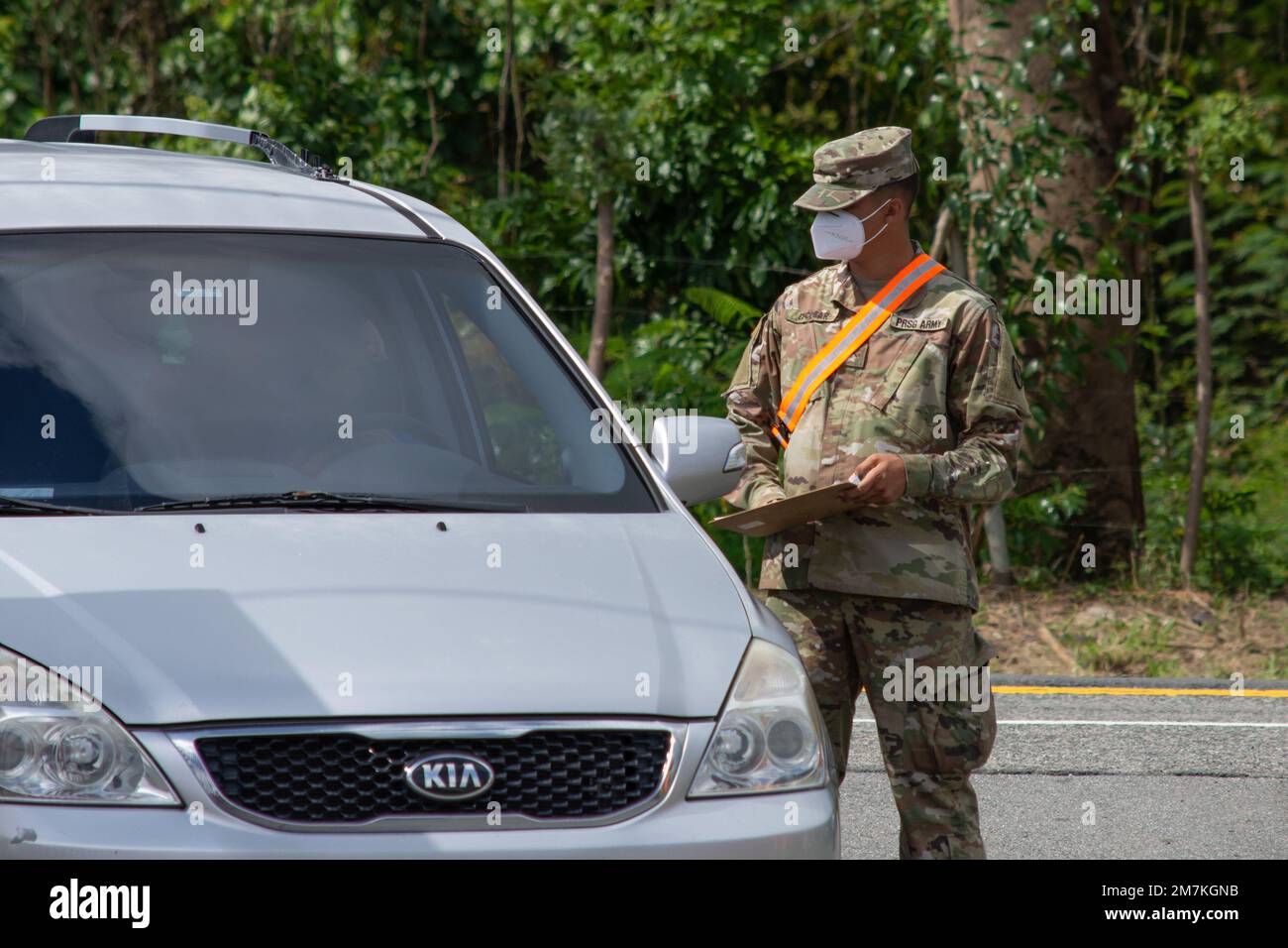 Pvt. Kevin Escobar of the Puerto Rico State Guard registers a person in ...