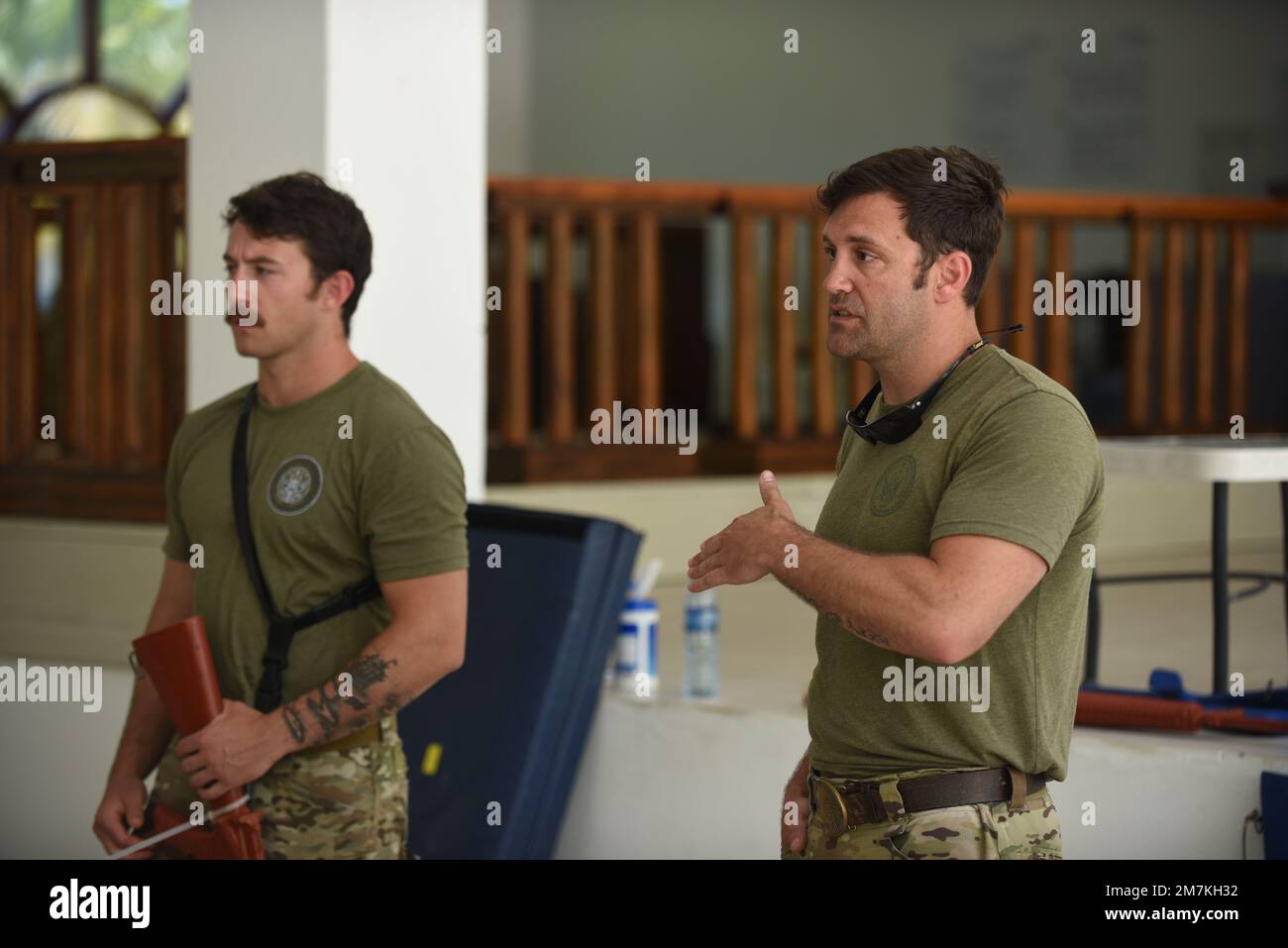 U.S. Coast Guard Chief Petty Officer Jason Zander and Petty Officer 2nd ...
