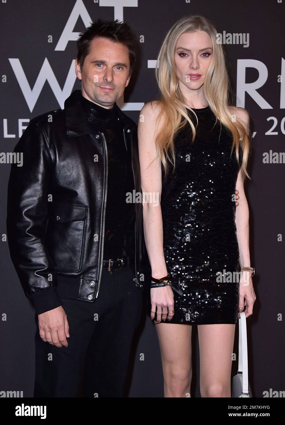 Matt Bellamy, left, and Elle Evans arrive at the Celine Fall/Winter ...