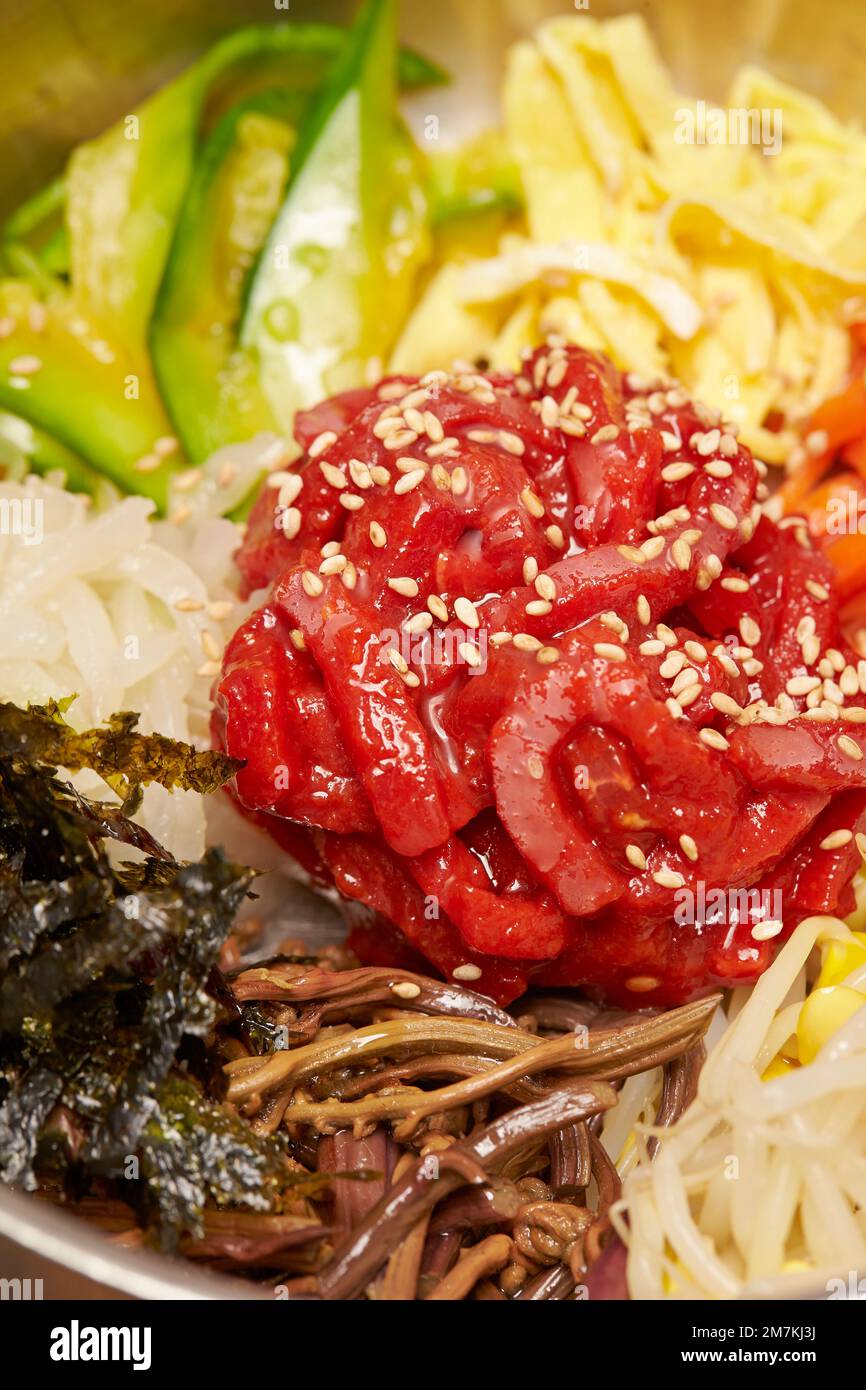Beef Tartare Bibimbap, Yukhoe bibimbap Stock Photo - Alamy