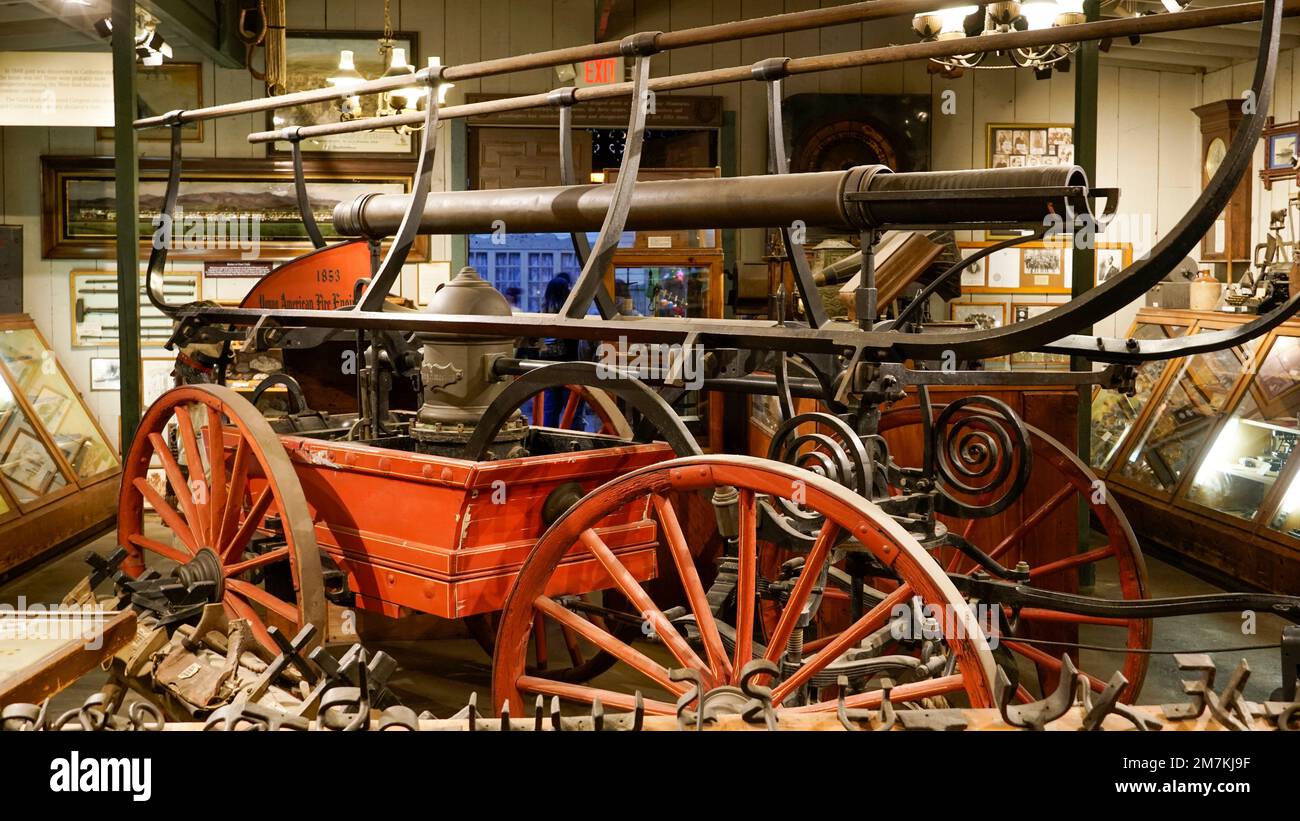 An old west fire engine inside museum Stock Photo - Alamy