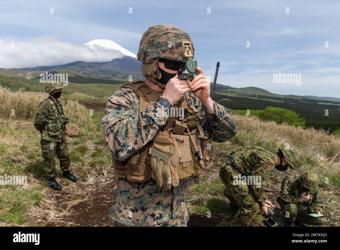 U.S. Marine Capt. Kurt James, center, a joint terminal attack ...