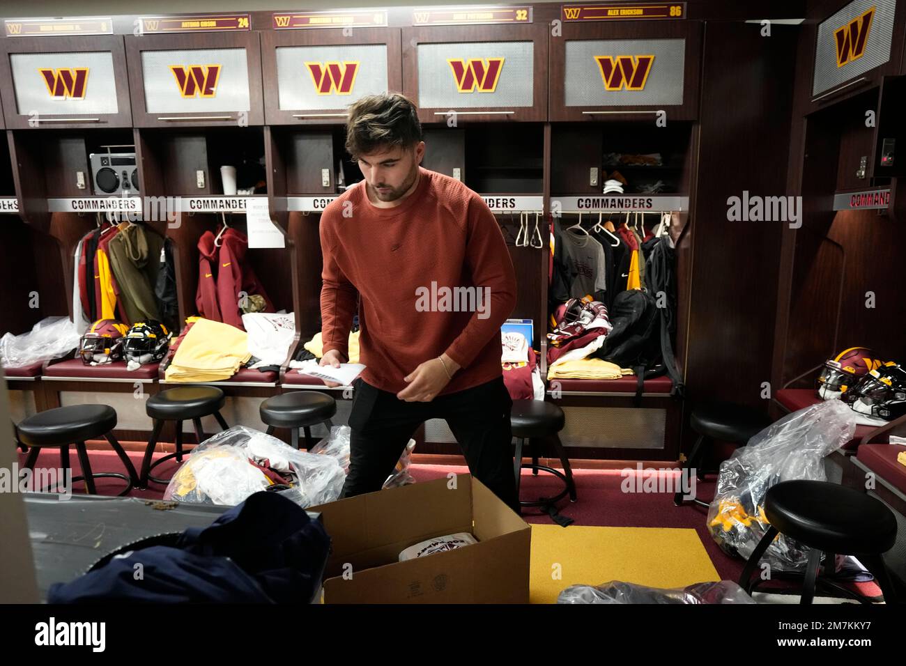 Washington Commanders quarterback Sam Howell packs his belongings from ...