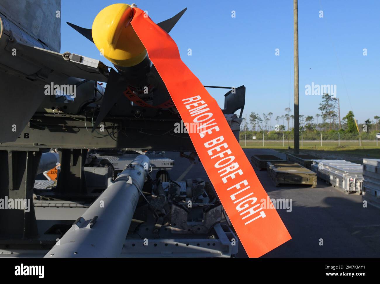 A “Remove Before Flight” tag hangs from an AIM-9M Sidewinder missile at ...