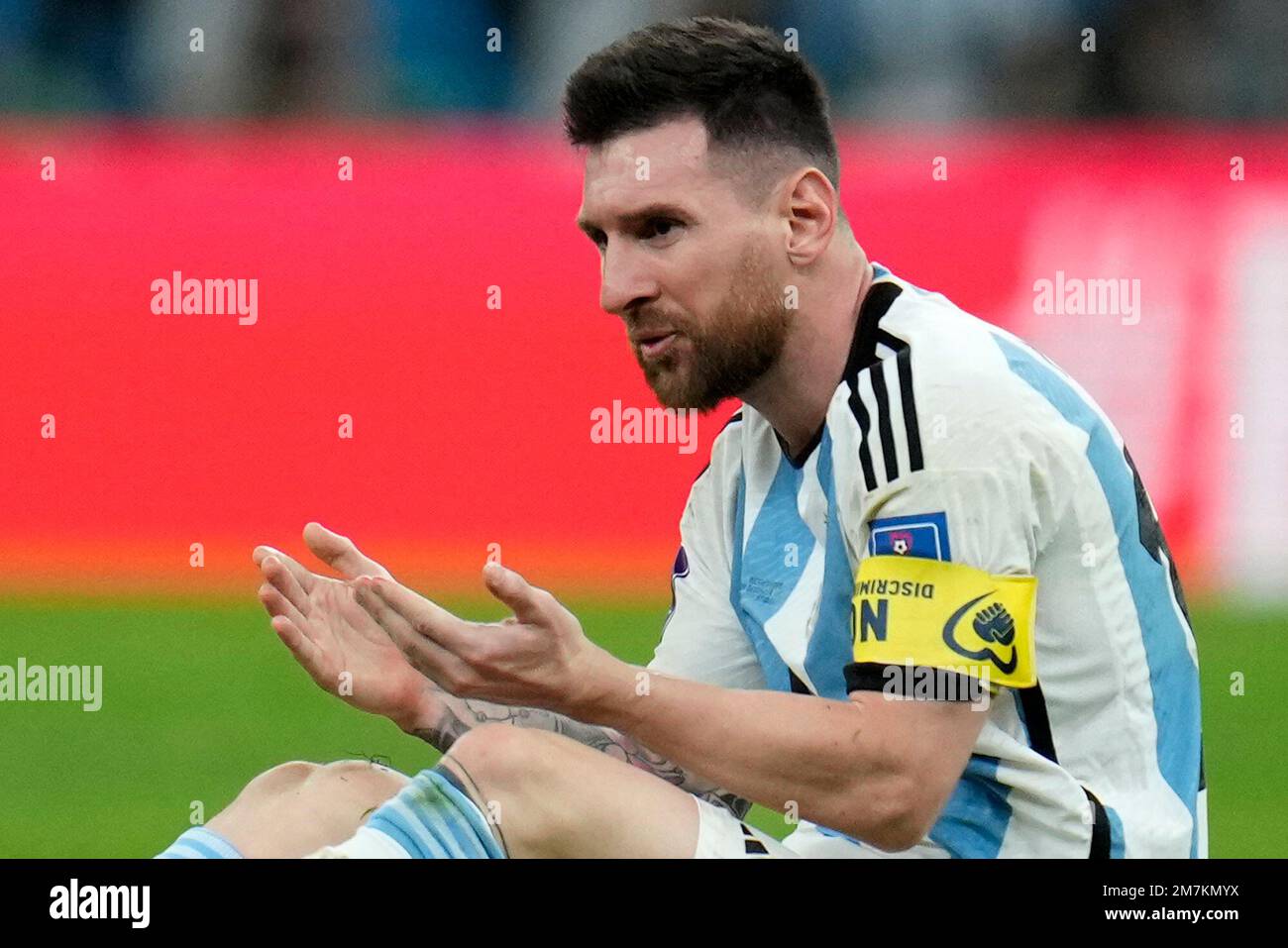 Argentina's Lionel Messi bleeds from his mouth after a clash during the ...