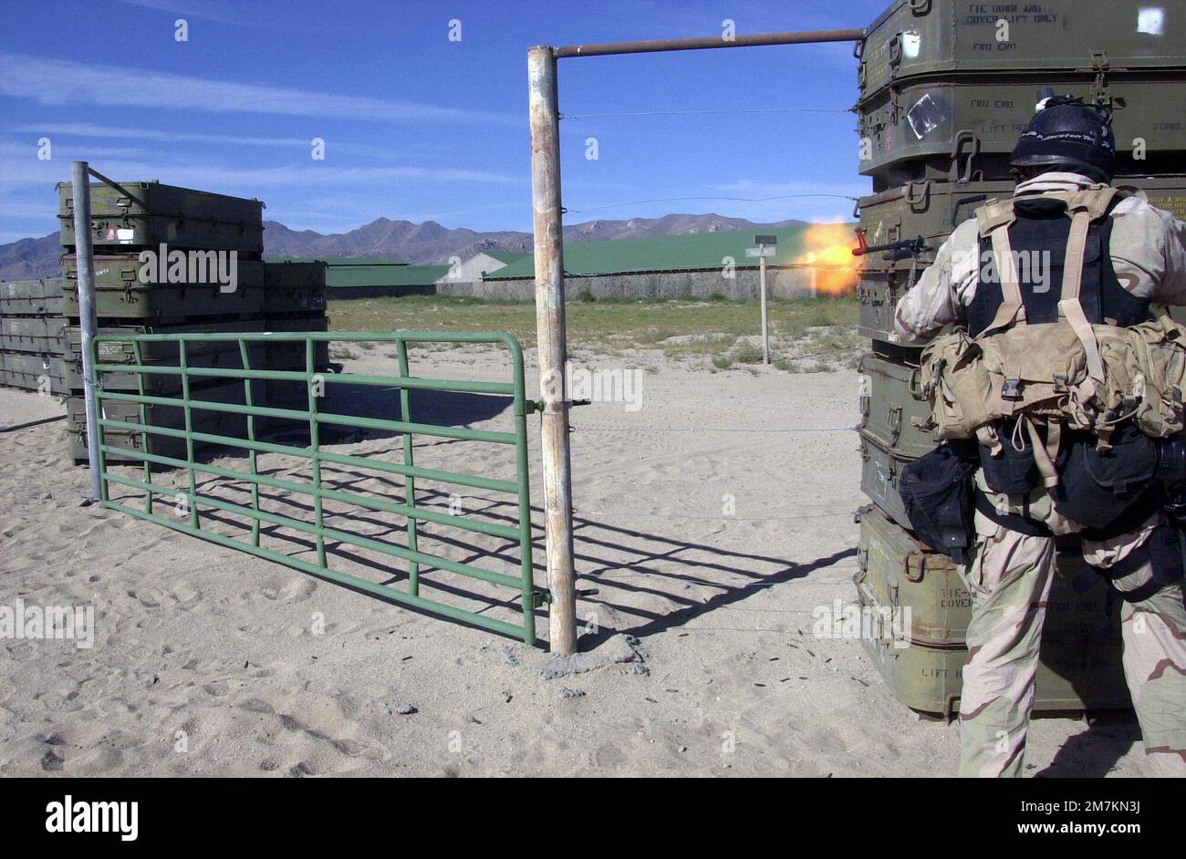 An M60 machine gun fires as rescue forces engage the enemy on the ...