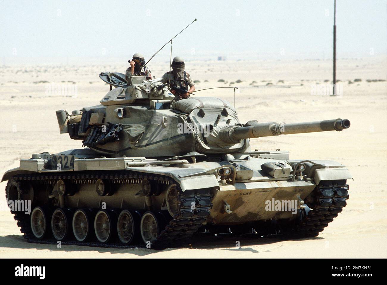 American soldiers demonstrate the capabilities of an M-60A1 main battle ...