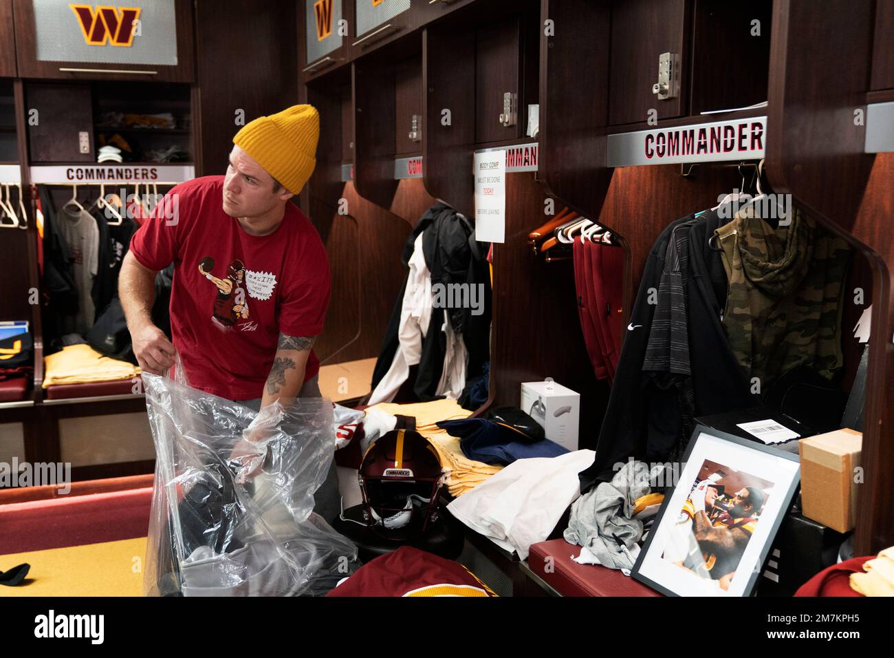 Washington Commanders quarterback Taylor Heinicke packs his belongings ...