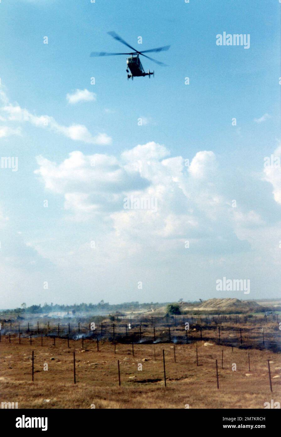 DF-SD-03-17787. [Complete] Scene Caption: As the Kaman HH-43F Huskie ...