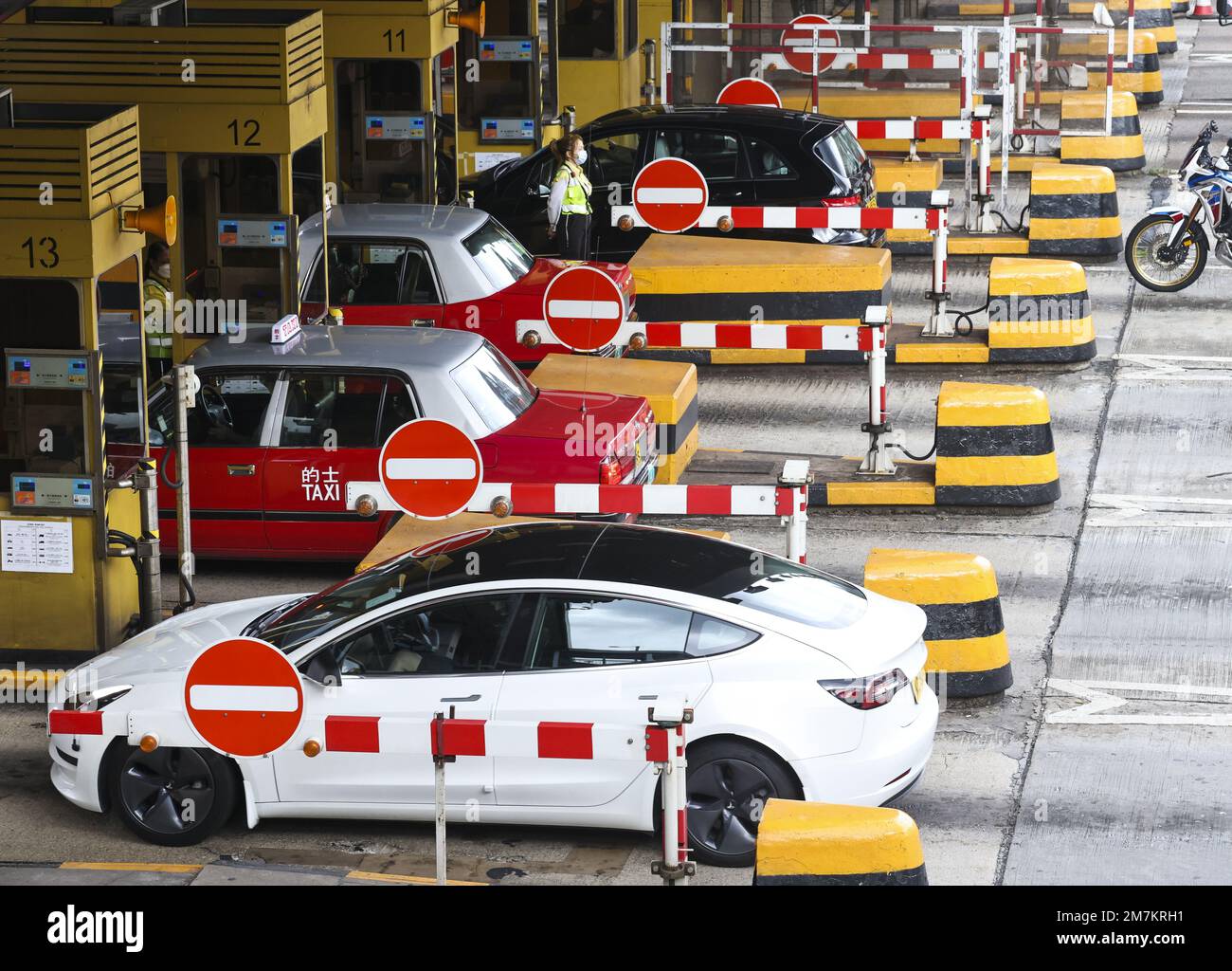Traffic queues to use the Cross-Harbour Tunnel during its peak hour at ...