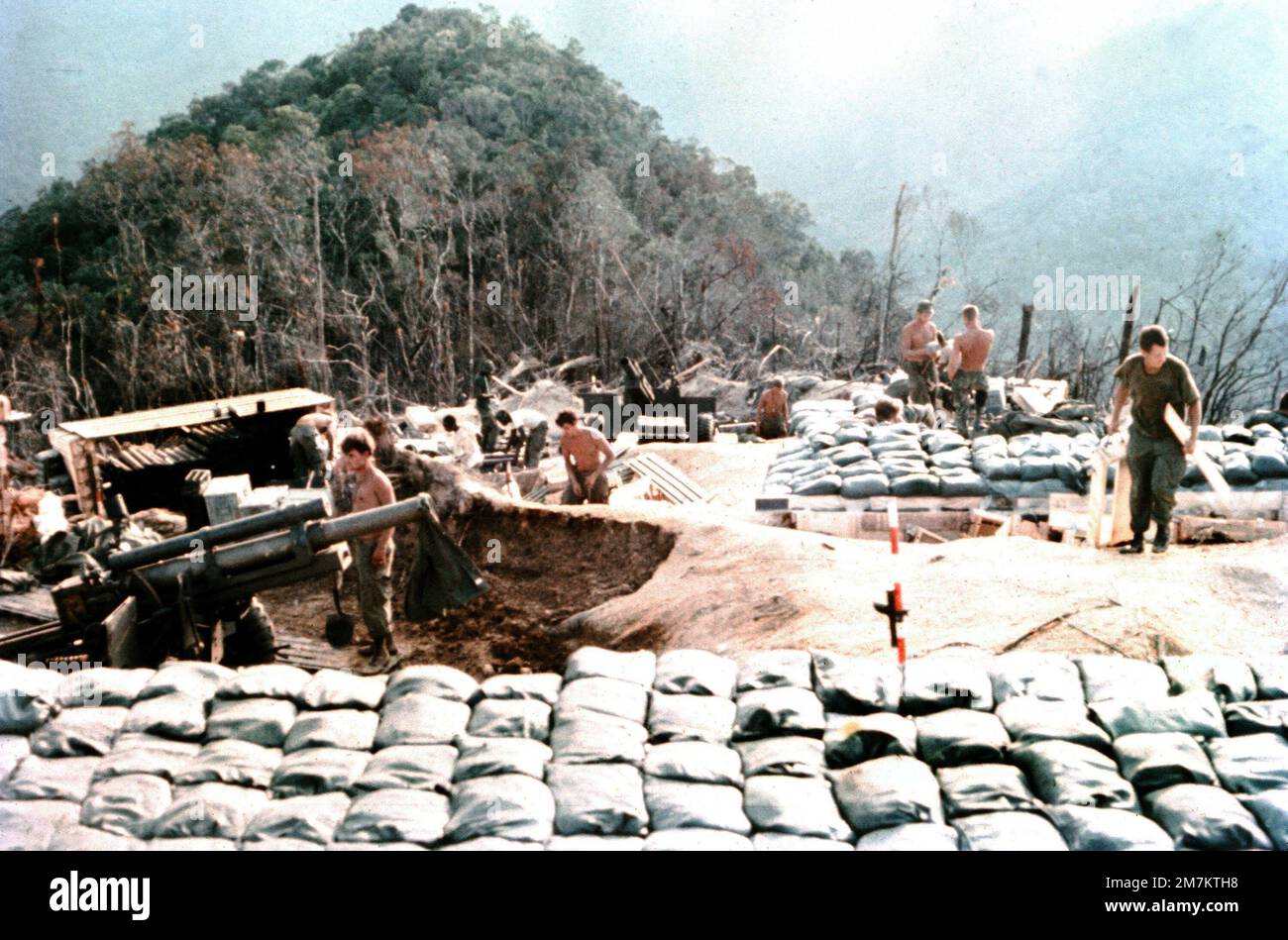 Members of the 3rd Marine Division complete construction of M101 105 mm ...