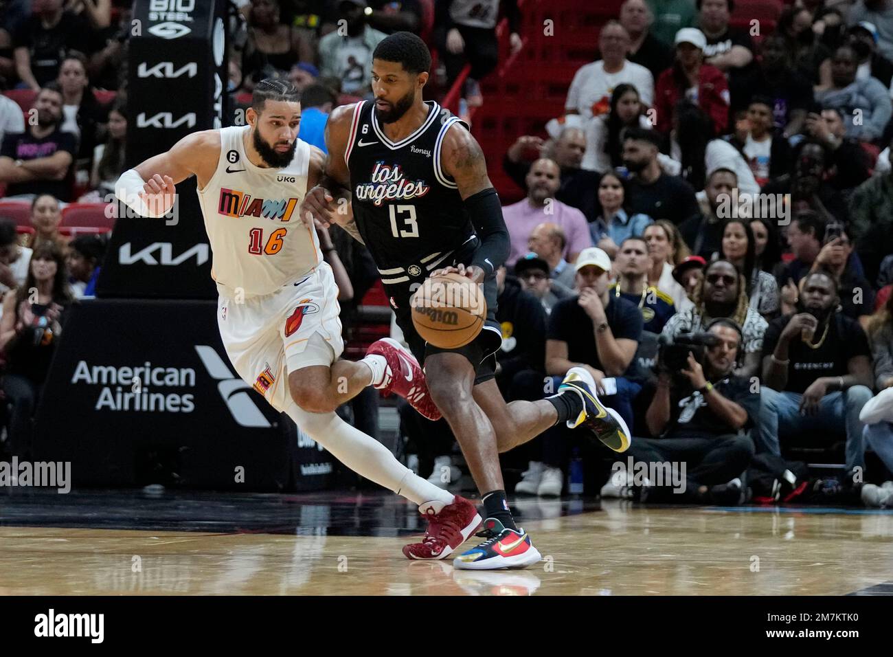 Los Angeles Clippers forward Paul George (13) is pursued by Miami Heat ...