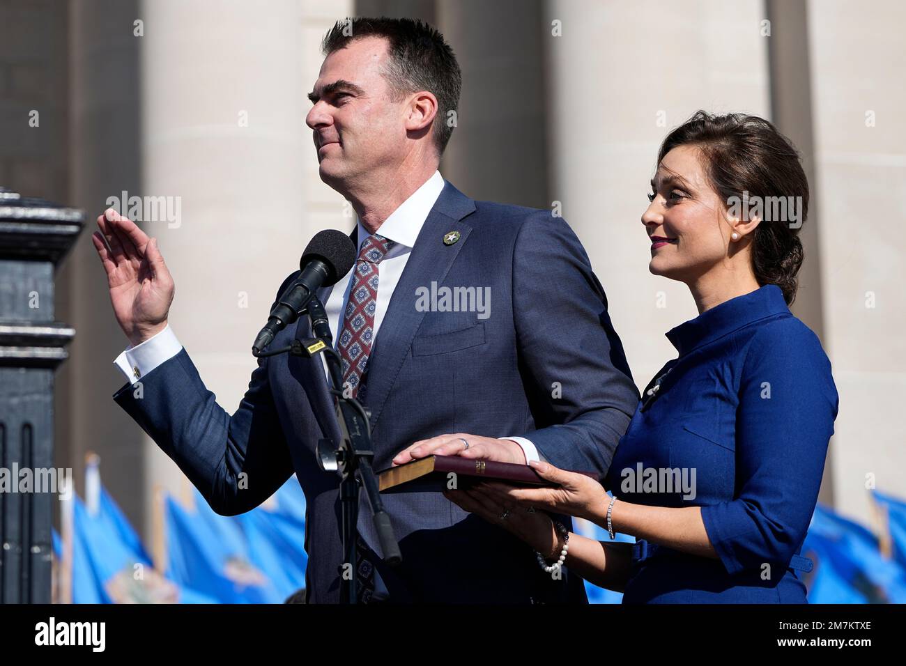 Oklahoma Gov. Kevin Stitt, left, takes his oath of office during ...