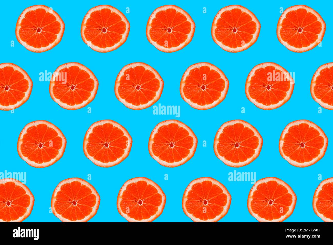 Grapefruit pattern isolated on blue background. Flat lay Stock Photo ...