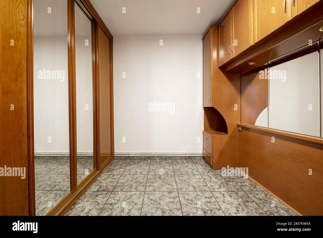 Bedroom without a bed with bridge furniture on the mezzanine and a ...