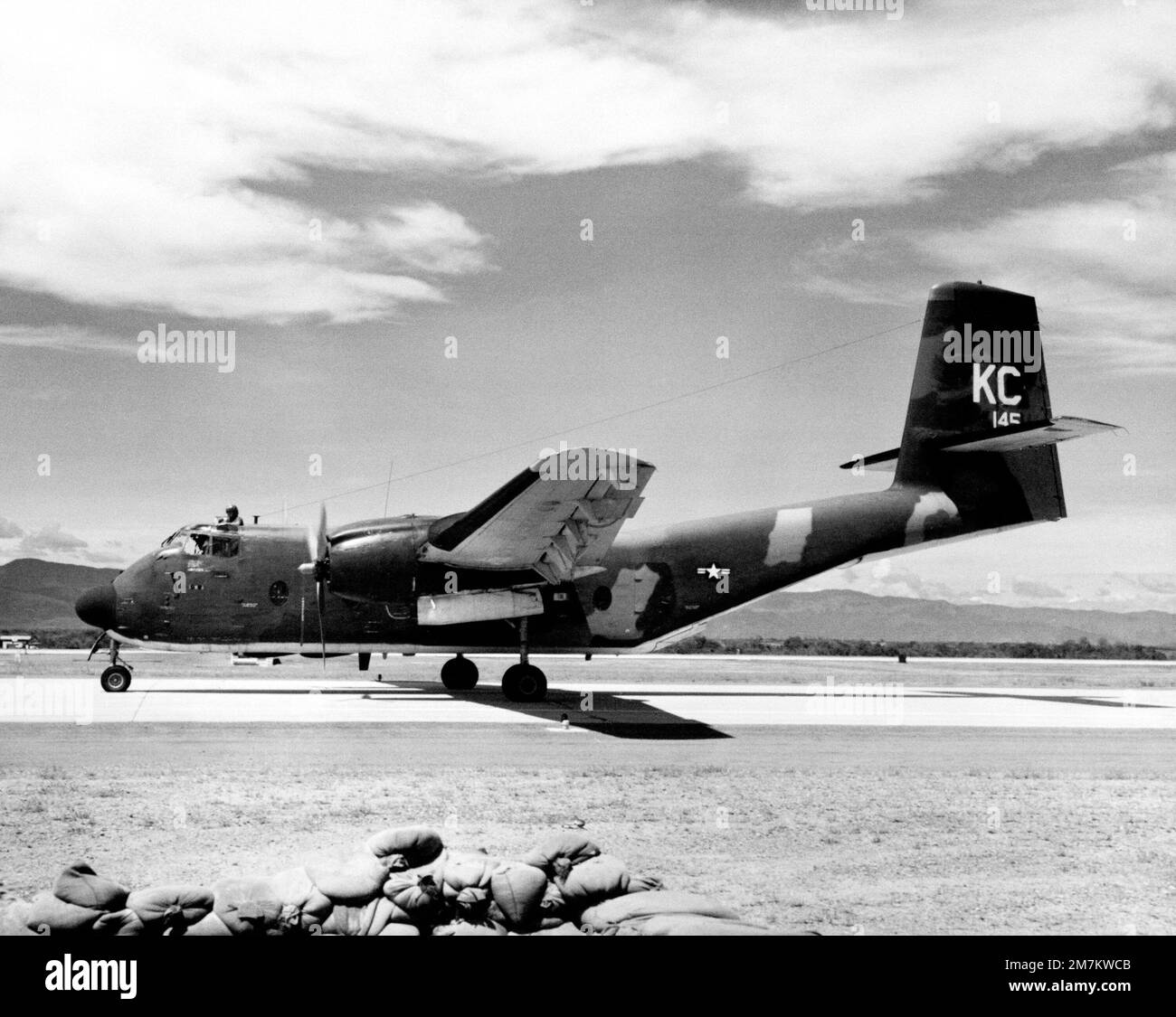 Left side view of a C-7B Caribou aircraft ready for take-off. Country ...