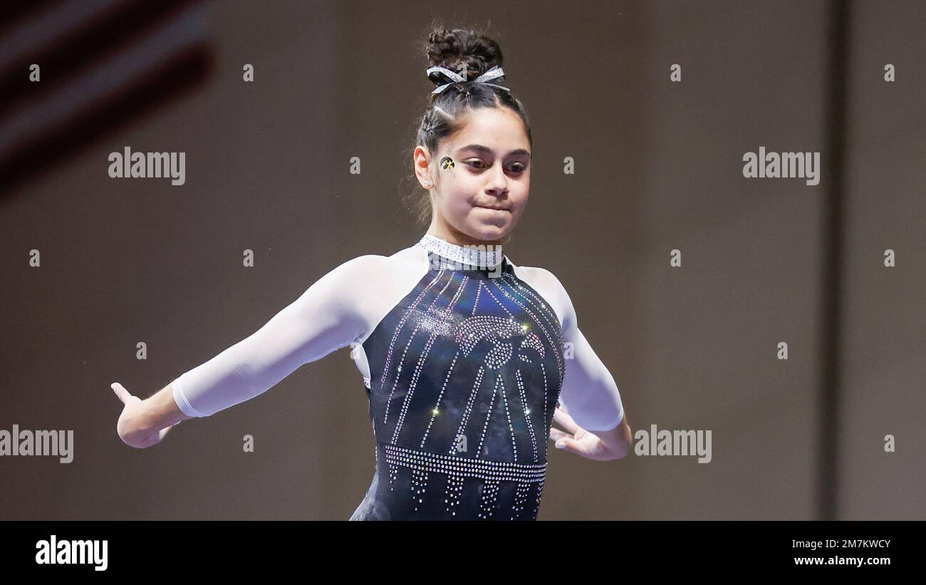 Iowa's Marissa Rojas competes on the balance beam during an NCAA ...