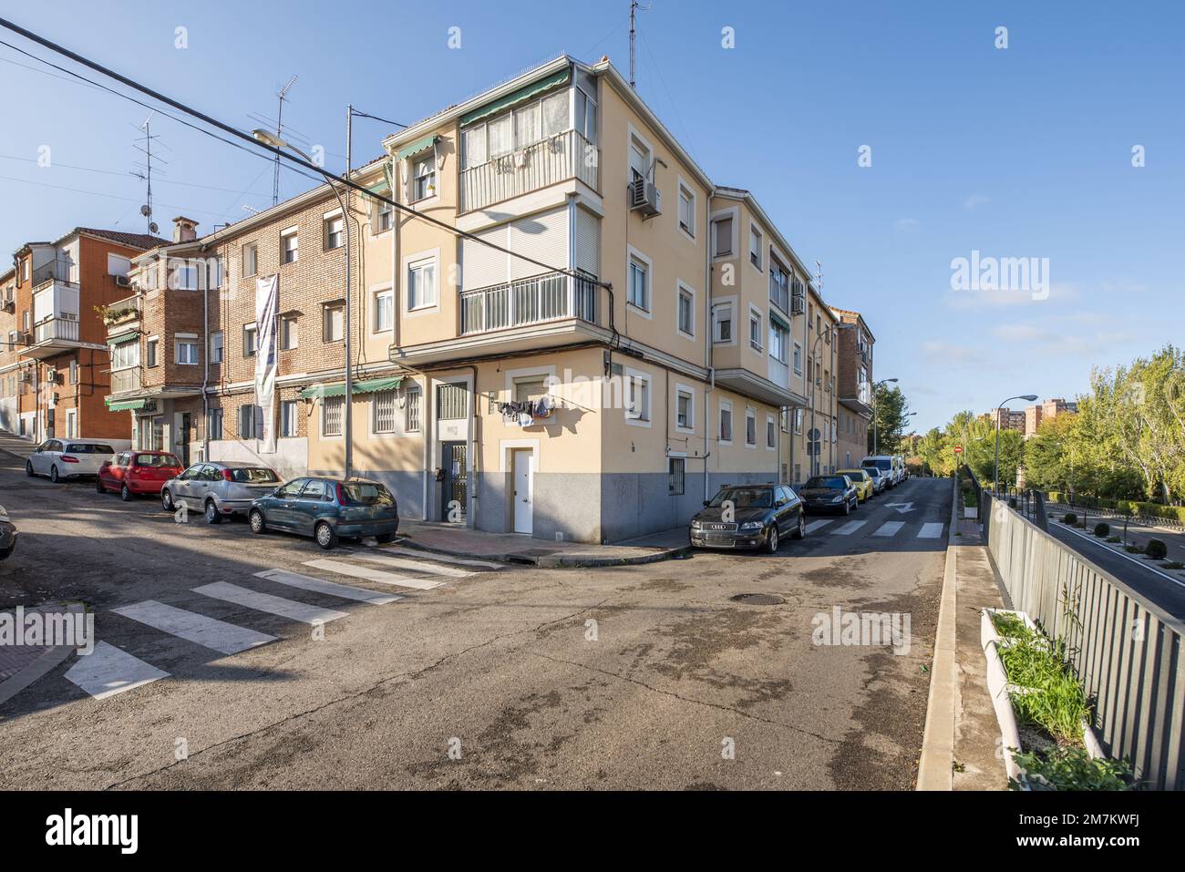 Facades of old low-rise residential houses on a sunny winter day with ...