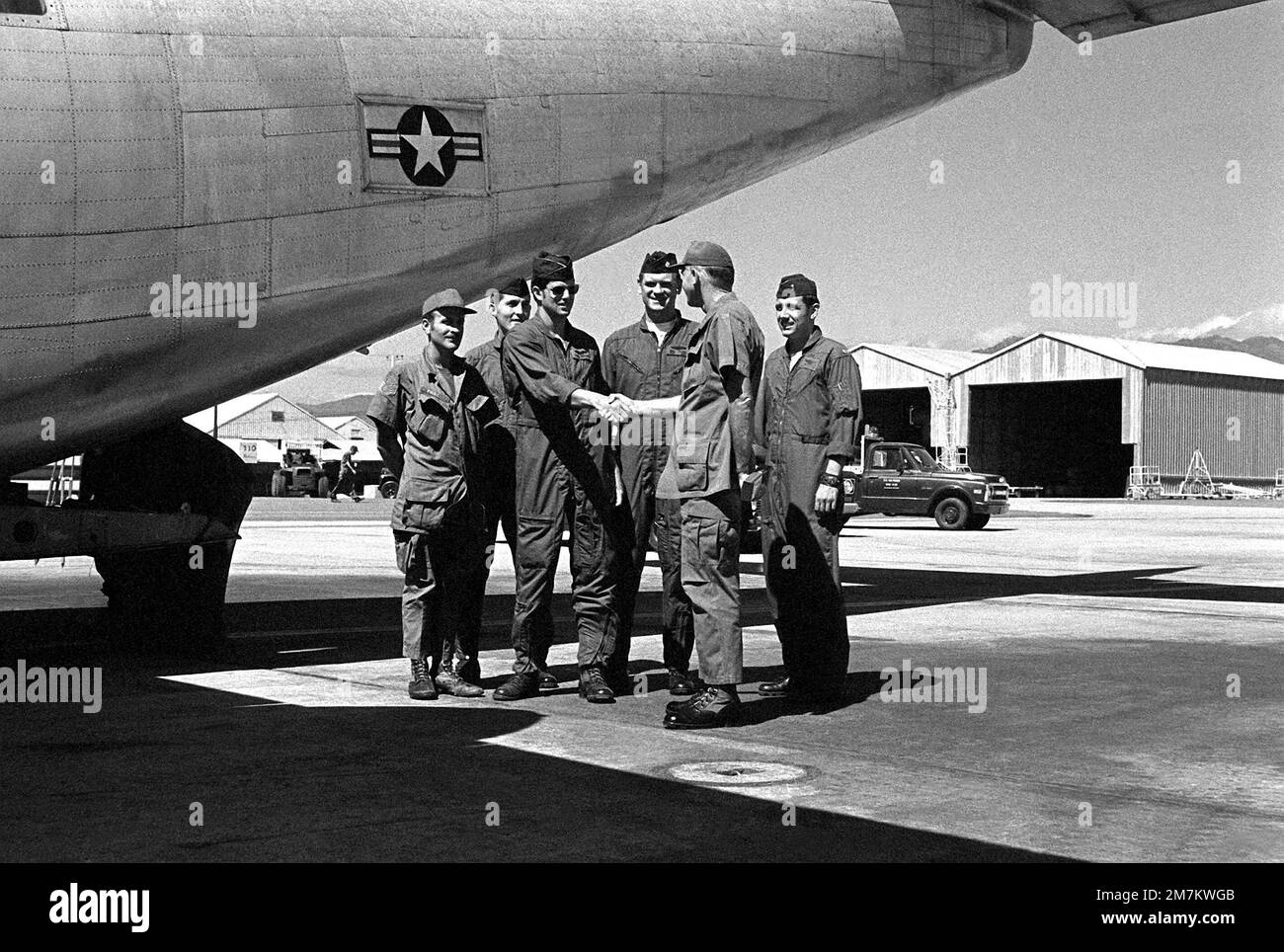 COL Ray C. Staley, commander, 315th Tactical Airlift Wing, greets a UC ...
