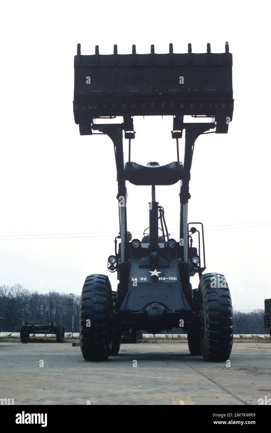 A front view of an Army scoop-type loader. Country: Unknown Stock Photo ...