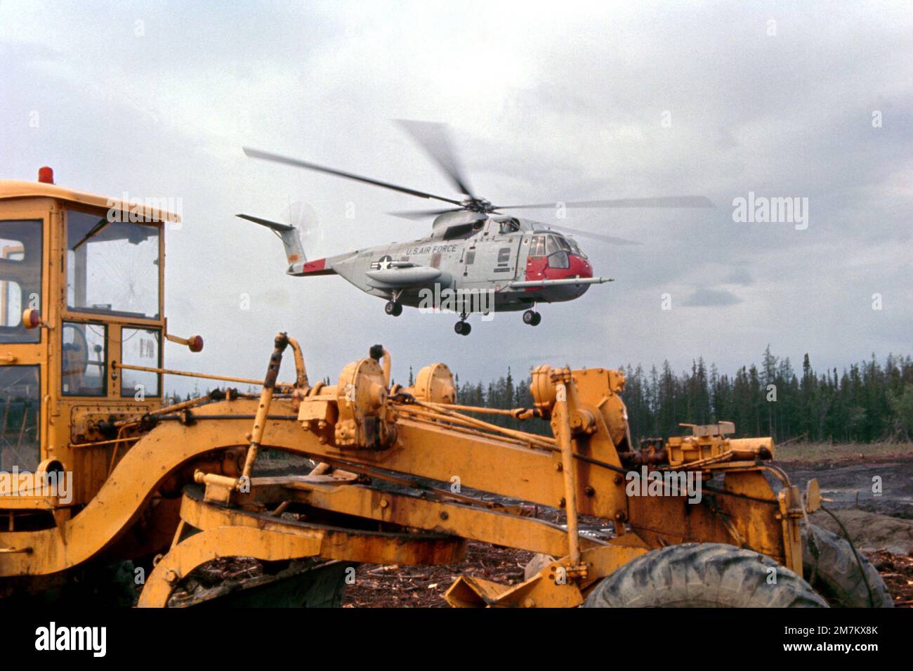 Right side view of an HH-3 helicopter coming in to land on the newly ...