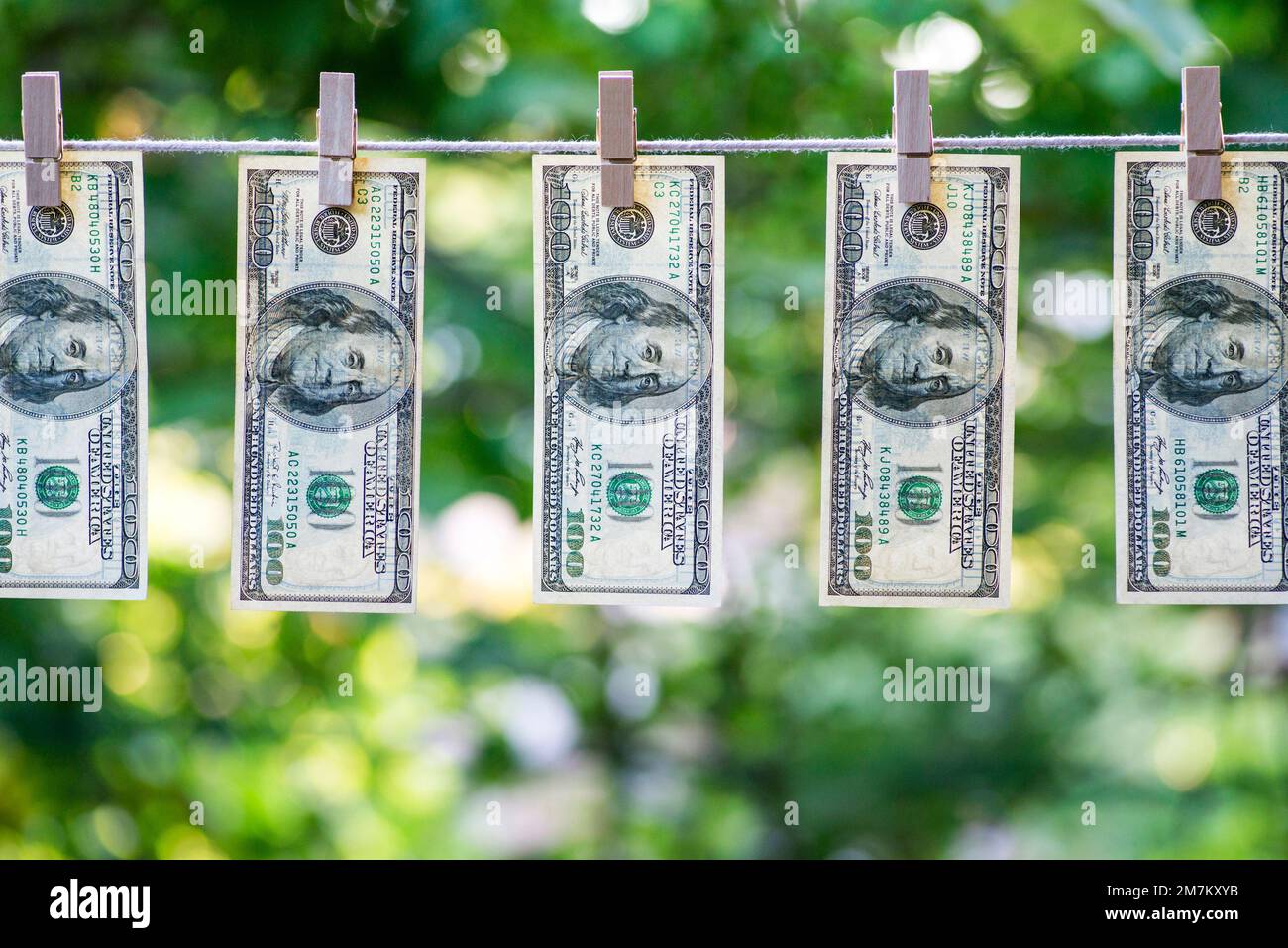Money hanging out dry hi-res stock photography and images - Alamy