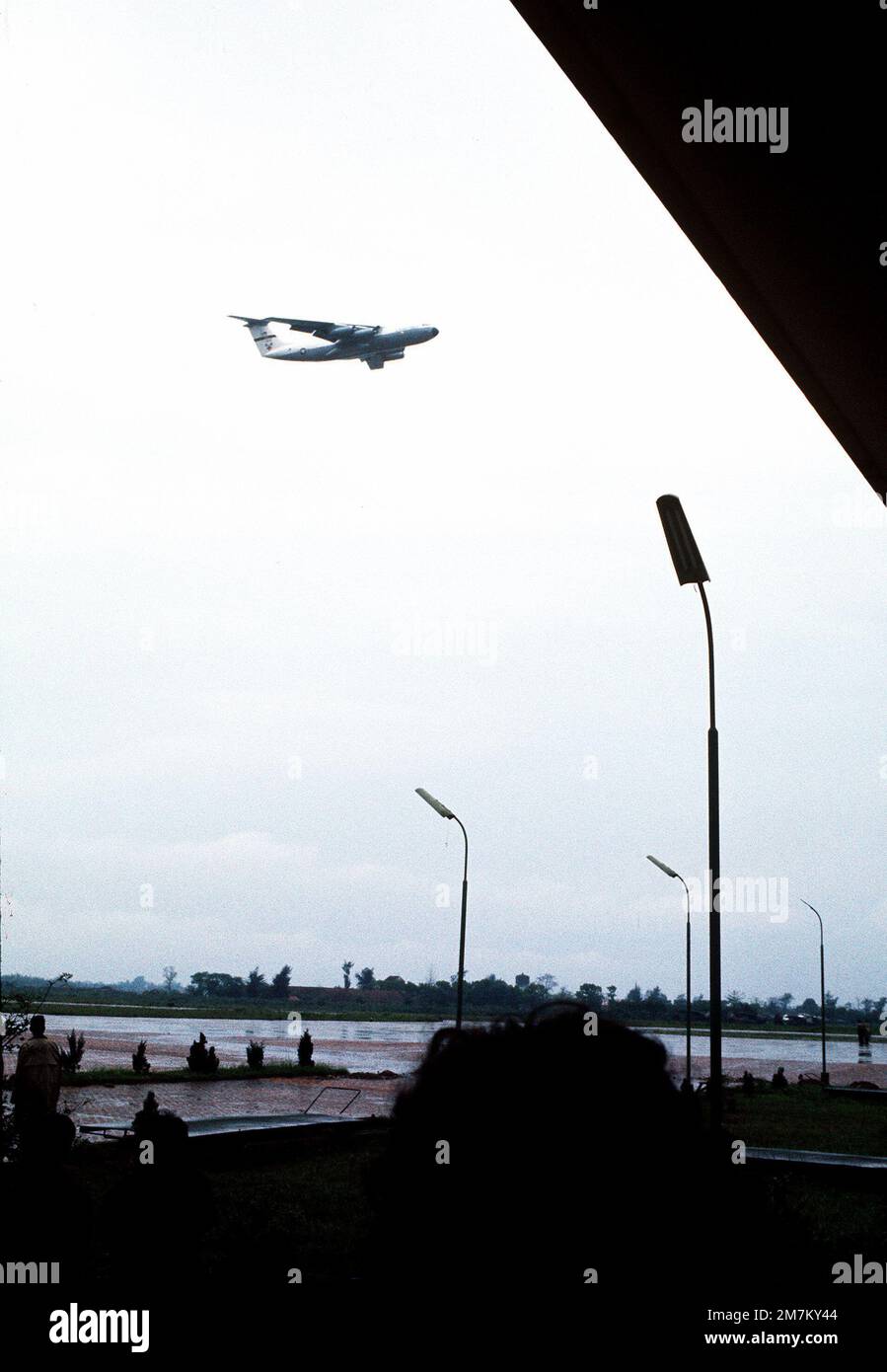A C-141 Starlifter aircraft departs Gia Lam Airport carrying recently ...