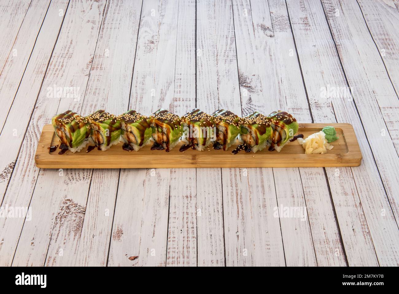 Uramaki is rolled sushi, except the outer layer is sushi rice and the ...