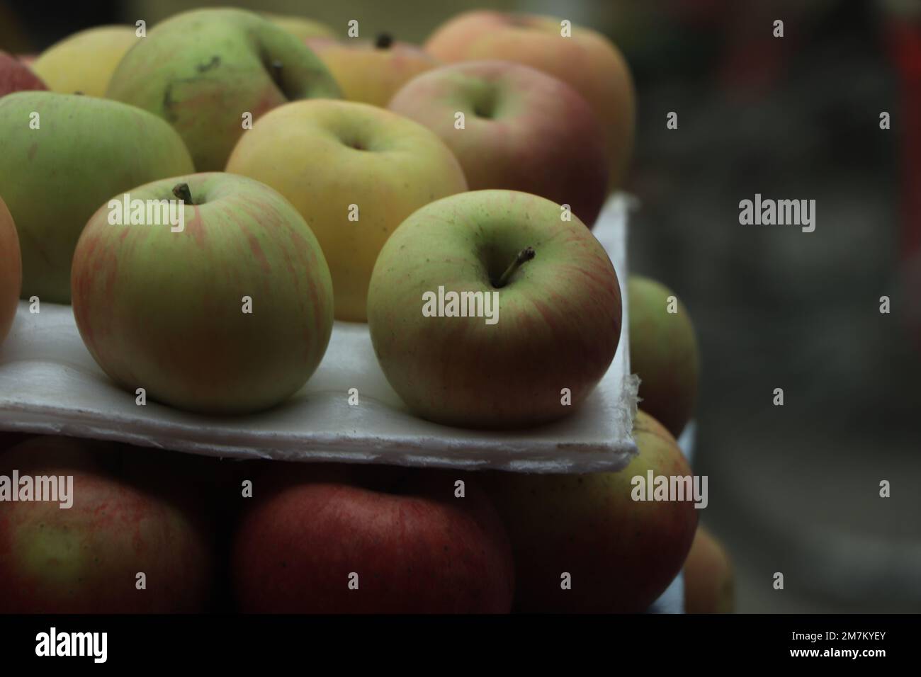Heap of red delicious apples under the sunlight, Top view, background ...
