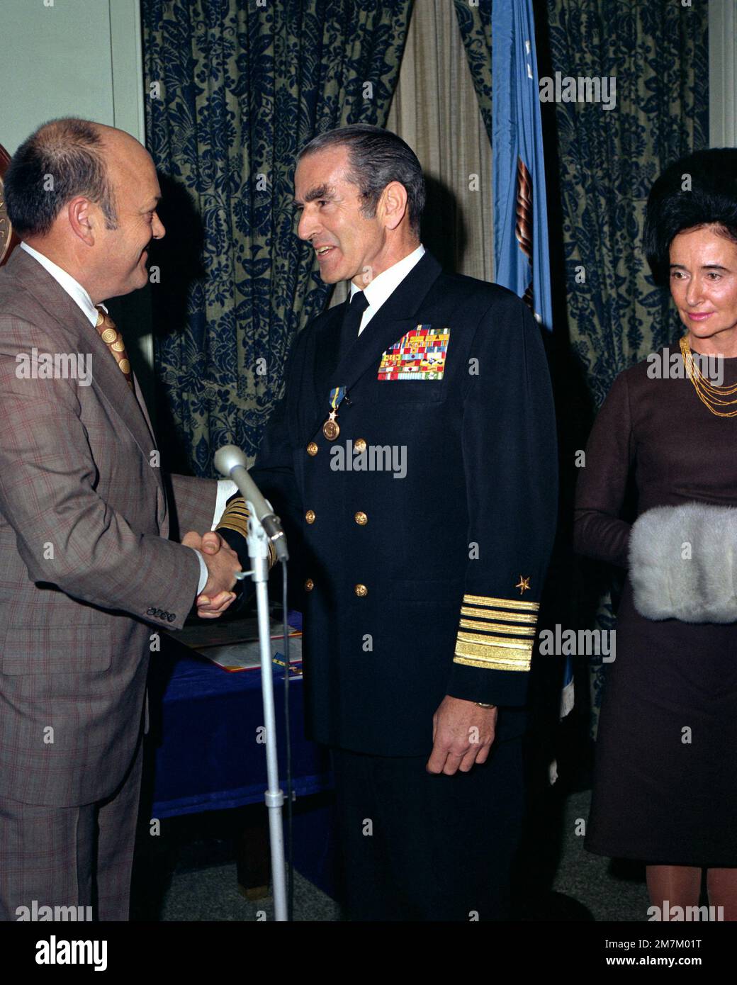 Secretary of Defense Melvin R. Laird, left, congratulates Adm. Elmo R ...