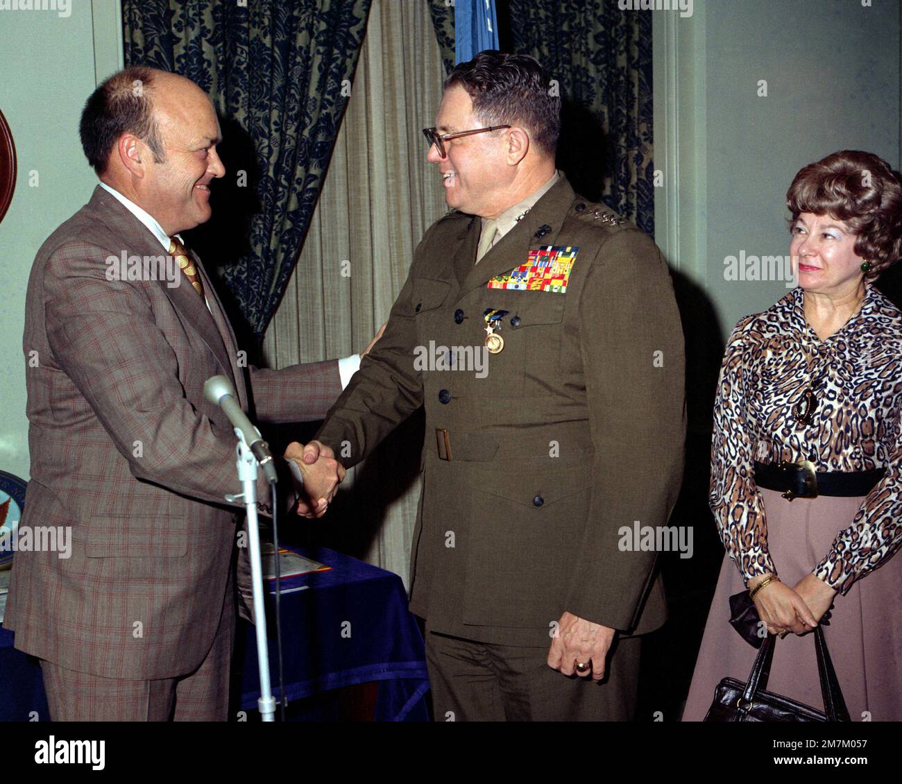 Secretary of Defense Melvin R. Laird, left, congratulates GEN. Robert E ...