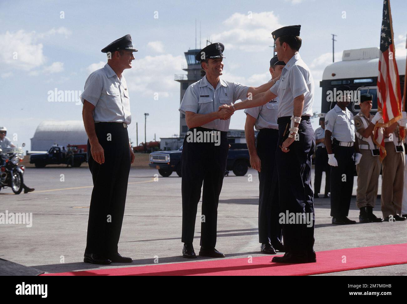 LGEN William G. Moore, Commander, 13th Air Force, on left, watches as ...