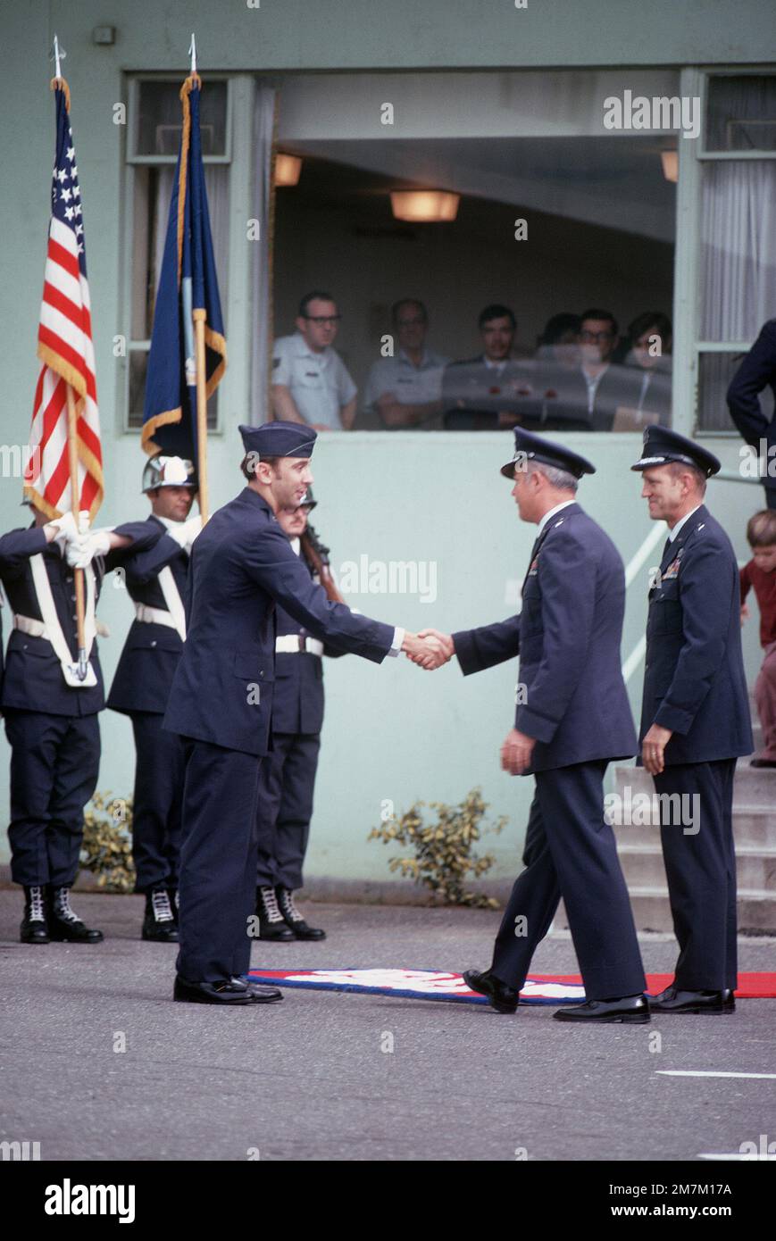 Former POW and U.S. Air Force CPT Lynn Guenther is greeted by BGEN ...
