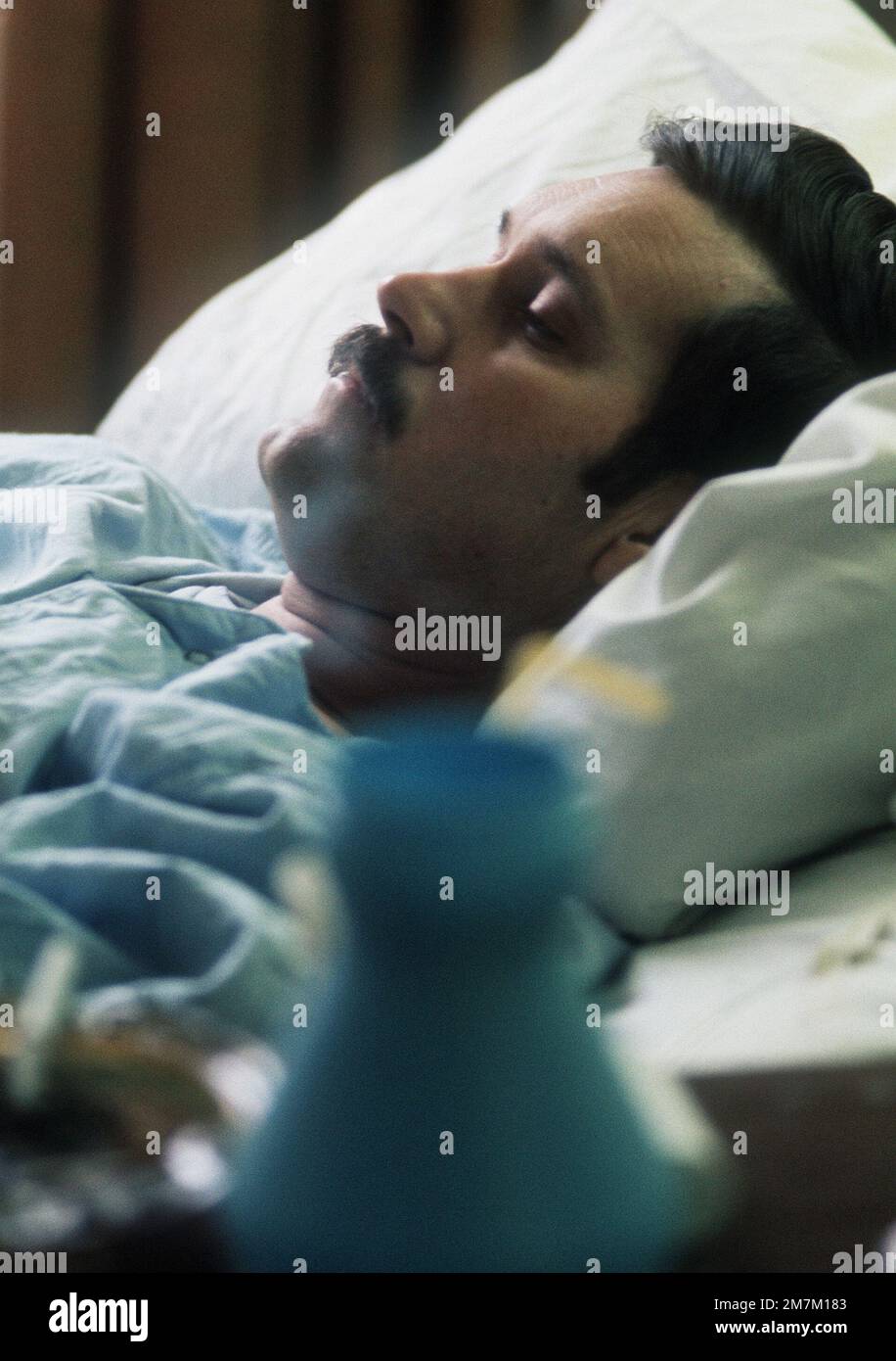 Former POW and U.S. Air Force SSGT Roy Madden Jr. in his hospital bed ...