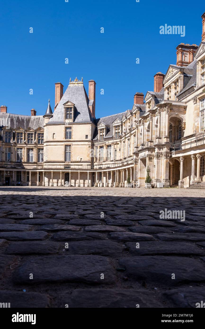 Fontainebleau (Paris area): the Oval Courtyard and the square tower of ...