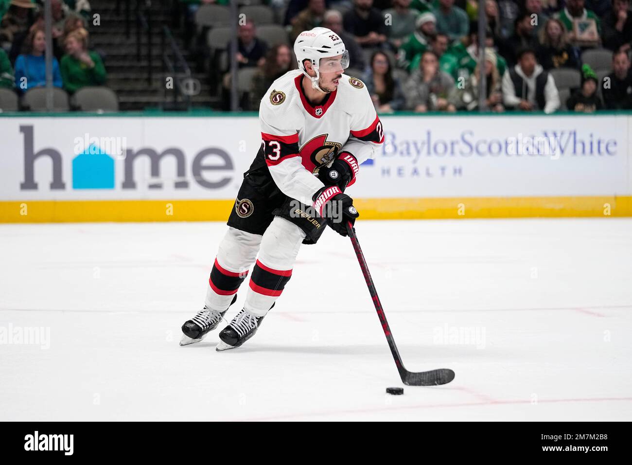 Ottawa Senators defenseman Travis Hamonic controls the puck during an ...