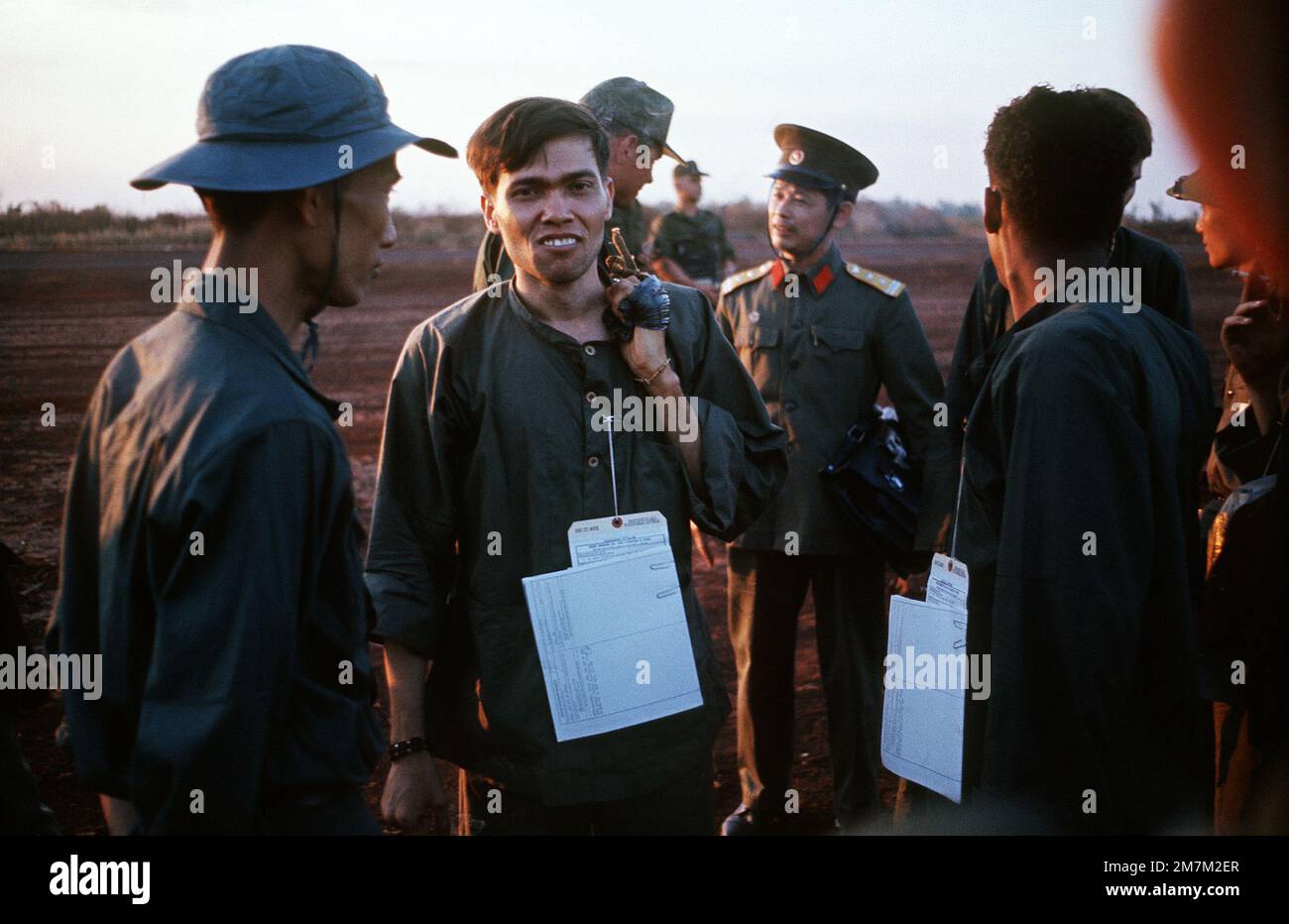 SGT Felix V. Neco-Quinones, U.S. Army, (Captured 16 Jul 68) stands with ...